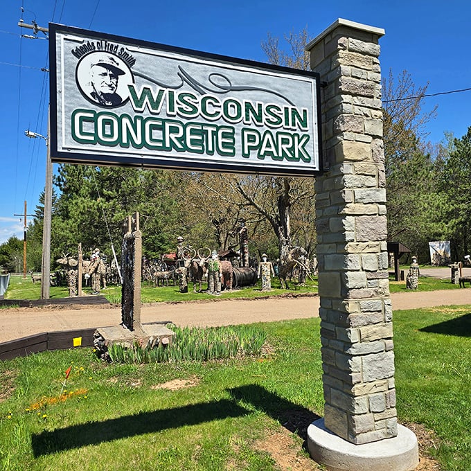 The entrance sign promises concrete adventures ahead&mdash;like Disneyland for folk art enthusiasts, minus the $200 ticket price.