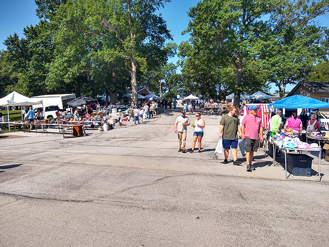 The weekend pilgrimage begins here. Shoppers stroll through aisles of possibility, where every table holds potential discoveries waiting to be unearthed.