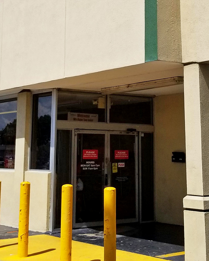 Yellow safety bollards stand guard at the entrance like sentinels of savings. They seem to say, "Prepare your wallet for mercy&mdash;it's about to get a much-needed break."