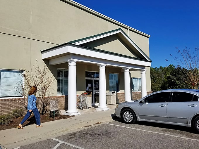 The unassuming entrance belies the wonderland within. Like finding Narnia in your neighborhood, this columned doorway leads to bargain paradise.