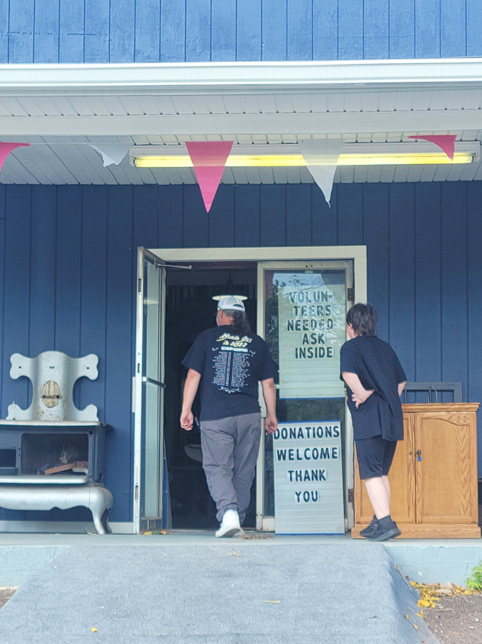 "Volunteers Needed, Ask Inside" &ndash; the gateway to adventure where one person's castoffs become another's prized possessions. The thrill of the hunt begins here!