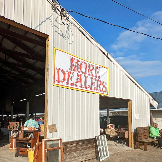 "MORE DEALERS" isn't just a sign—it's a promise of endless possibilities. This entrance beckons bargain-seekers into a world where patience pays dividends.