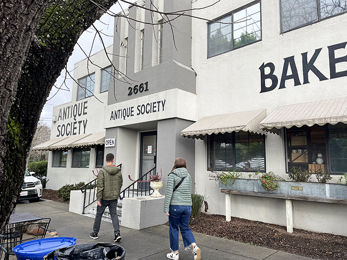 Approaching the entrance feels like standing at the gateway to the past. Two shoppers begin their journey into California's vintage paradise.