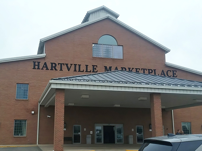 The brick facade of Hartville Marketplace stands like a cathedral to commerce, promising retail adventures that big-box stores simply can't deliver.