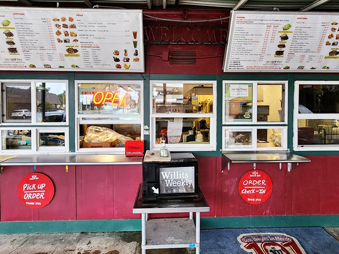 Step right up to the order window where culinary dreams meet reality through a simple speaker system.