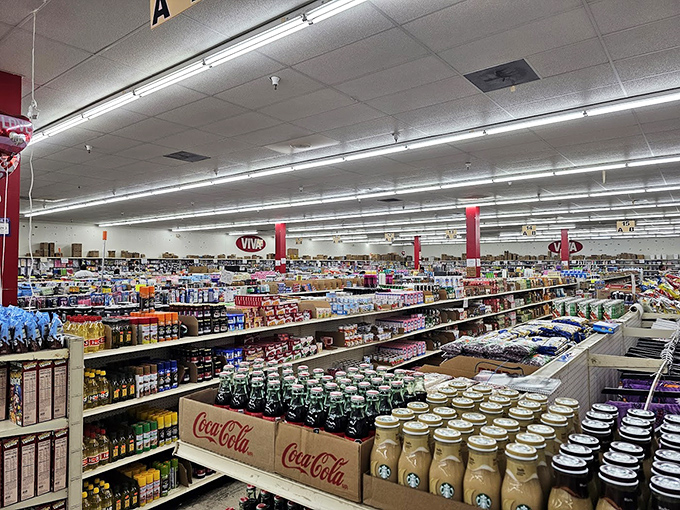 A wonderland of beverages where Starbucks bottled coffee mingles democratically with Coca-Cola, like a United Nations summit of refreshment.