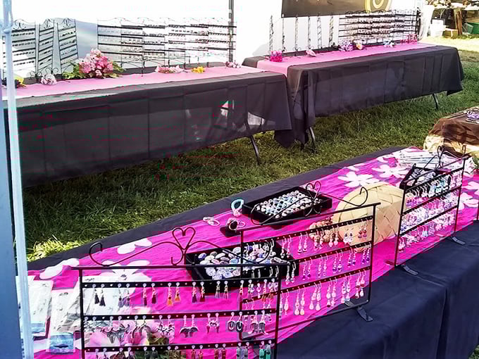 2. handmade jewelryDazzling displays of handcrafted jewelry await new owners, each piece telling its own story against vibrant pink backdrops.