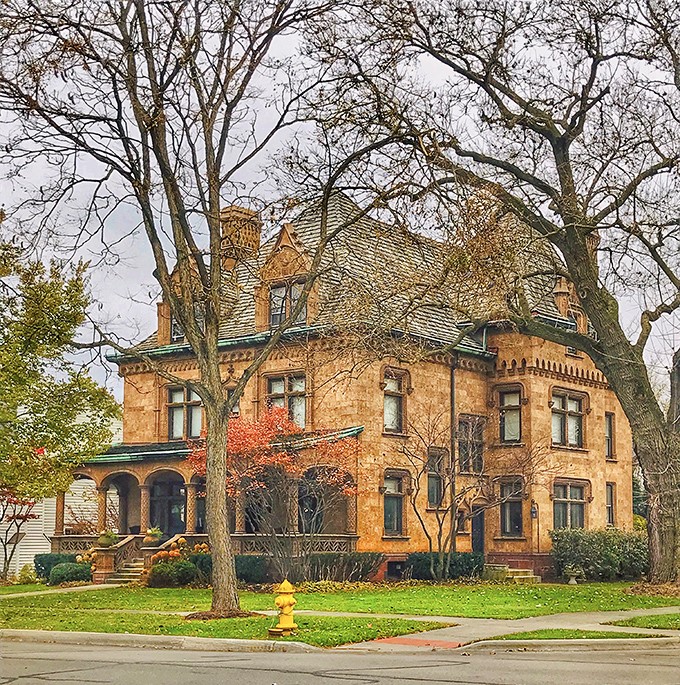 This honey-hued stone mansion isn't just a house&mdash;it's architectural swagger from an era when craftsmanship mattered more than square footage.