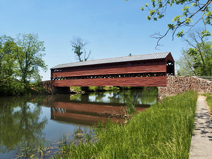Mother Nature frames her masterpiece perfectly, as Sachs Bridge's reflection doubles the visual delight for visitors lucky enough to discover this hidden gem.