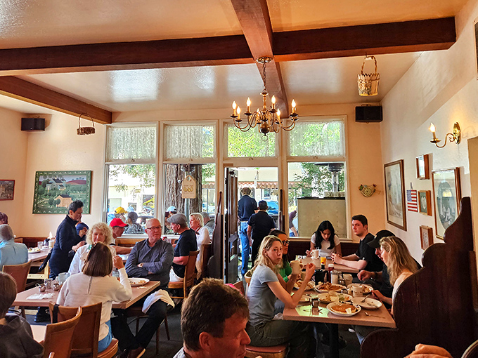 Inside, wooden beams and chandeliers create the perfect backdrop for breakfast drama &ndash; where the only conflict is deciding between benedicts and that famous French toast.