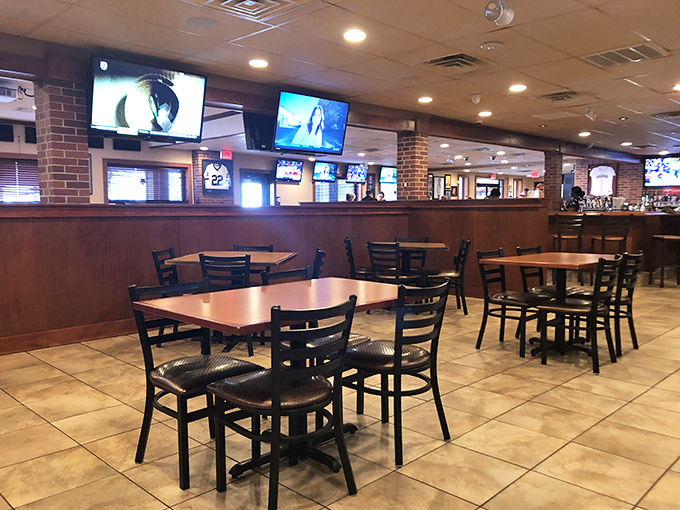 Classic sports bar ambiance meets comfortable dining &ndash; where every seat offers a view of the game and proximity to those legendary mozzarella sticks.