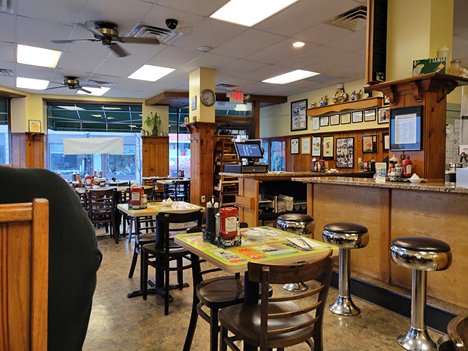 Classic diner charm with wood paneling and chrome stools &ndash; where breakfast dreams come true and calories don't count until tomorrow.