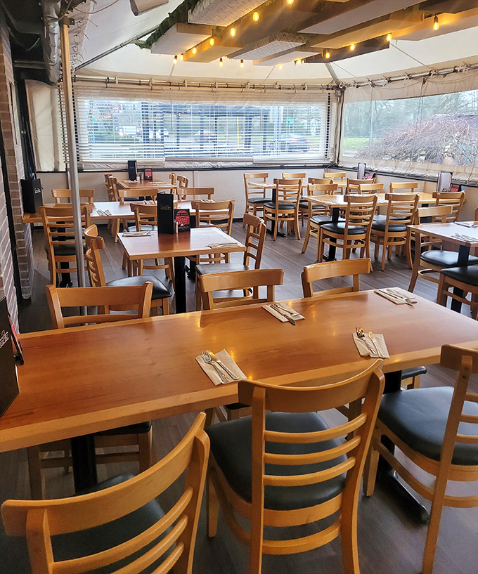 Warm wooden tones and comfortable seating create that perfect "neighborhood gem" atmosphere where memories are made between bites.