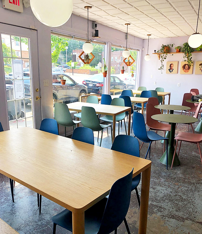 Mid-century modern meets cozy caf&eacute; in this light-filled space. The colorful chairs aren't just stylish&mdash;they're an invitation to settle in and stay awhile.
