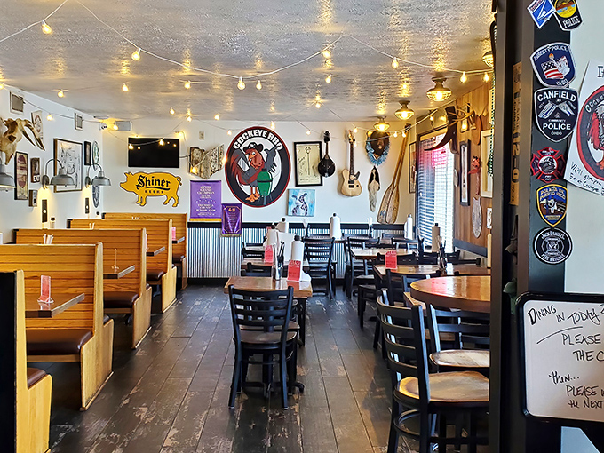 Church-like reverence meets roadhouse charm inside, where string lights and memorabilia create the perfect backdrop for barbecue worship.