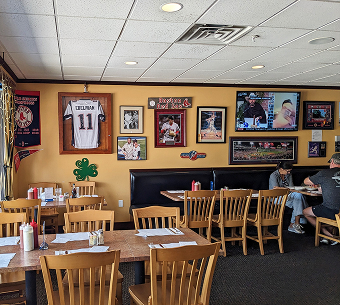 Boston sports memorabilia adorns the walls while wooden chairs await seafood pilgrims. It's like Cheers, if Norm ordered clams instead of beer.