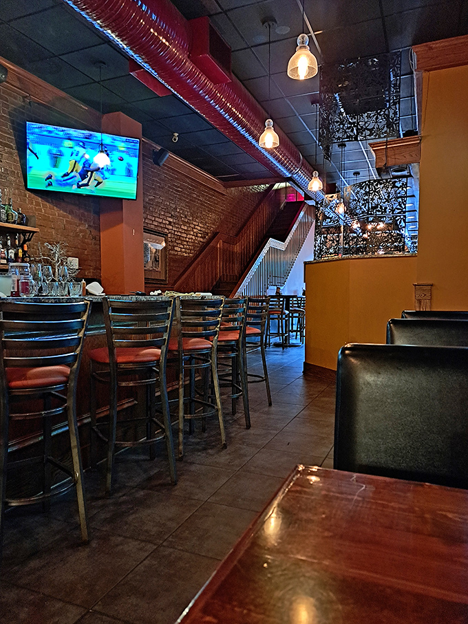 High ceilings, exposed brick, and pendant lighting create an atmosphere that's both rustic and refined&mdash;the perfect backdrop for comfort food that demands your full attention.