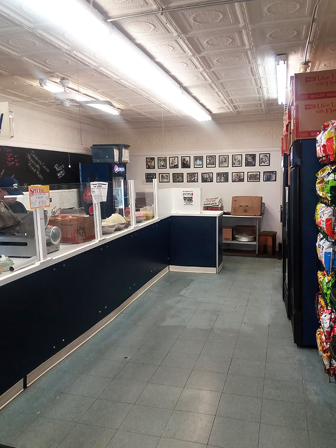 Inside, time stands still &ndash; pressed tin ceiling, no-nonsense counter, and black-and-white photos that tell stories of Philly's sandwich past.