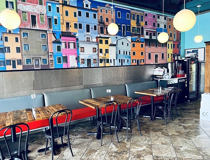 Naples comes to Arlington through this colorful mural. The vibrant Italian cityscape reminds you that pizza isn't just food&mdash;it's heritage. 