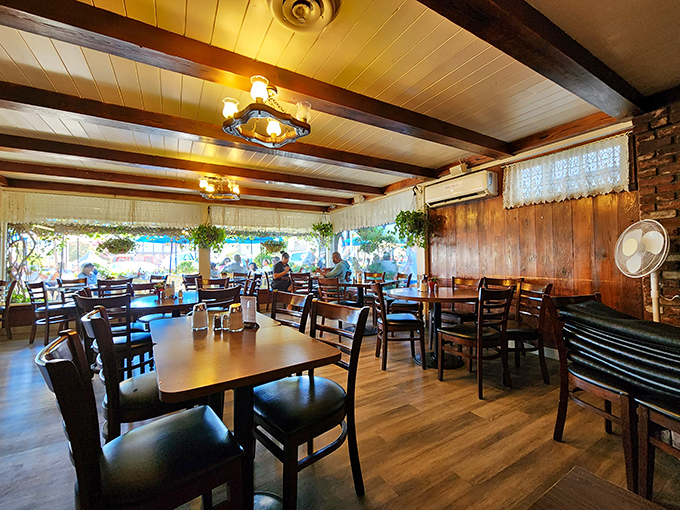 Warm wood paneling and exposed beams create that perfect "hygge" feeling&mdash;the Danish concept of coziness that pairs beautifully with pancakes and coffee.