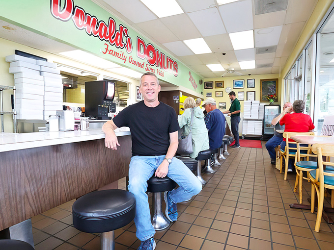 Counter culture at its sweetest. The classic diner-style seating invites you to slow down, savor your donut, and remember when breakfast wasn't something grabbed through a car window.