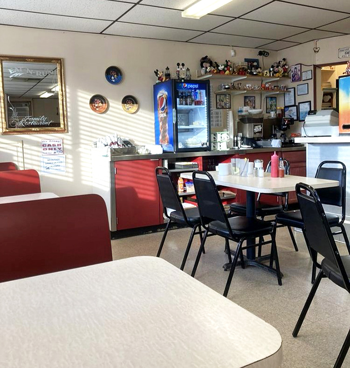 Inside, the classic diner aesthetic welcomes you like an old friend. Those Mickey Mouse collectibles aren't just decoration&mdash;they're conversation starters for strangers soon to become breakfast buddies.
