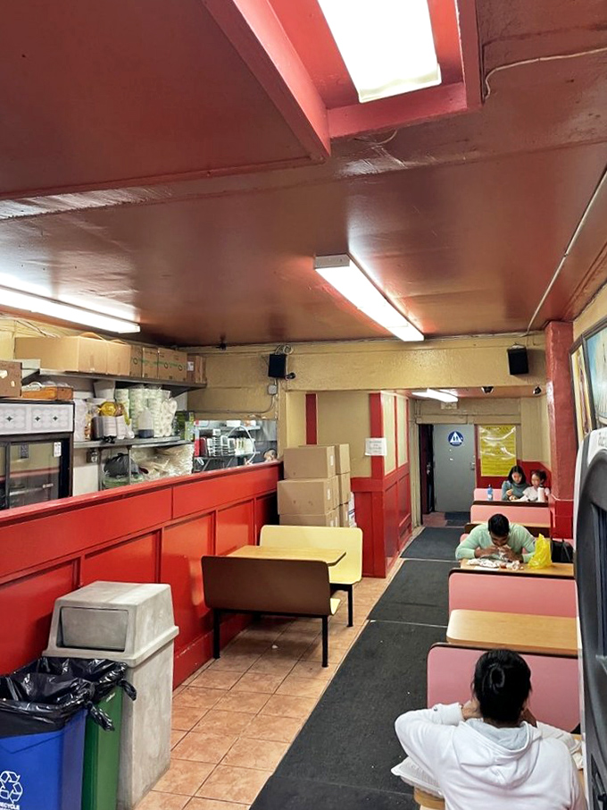 Inside, the no-frills red and yellow interior says everything you need to know: we're here for the food, not the feng shui.