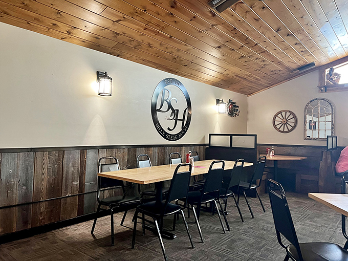 Warm pine ceilings, rustic wall sconces, and that iconic "BSH" emblem&mdash;Bill's interior feels like a cabin where beef is the religion.