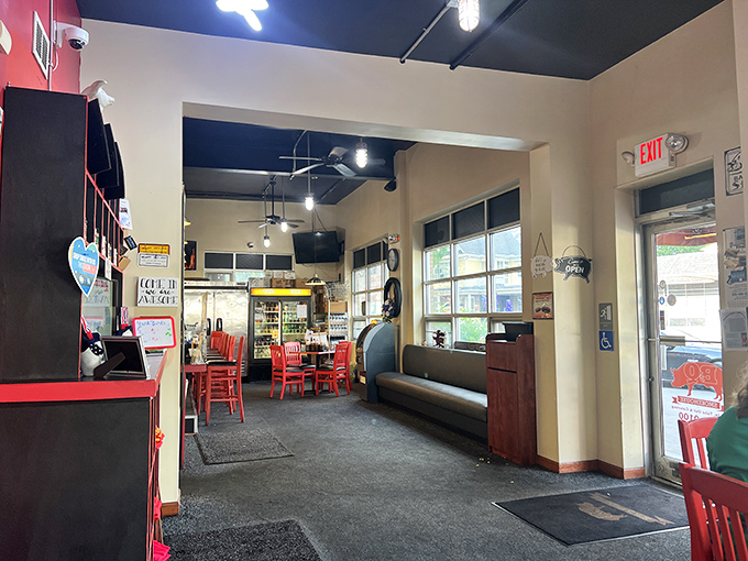 Red chairs and simple tables say, "We're not fancy, but our food is legendary." The kind of place where memories are made between bites.