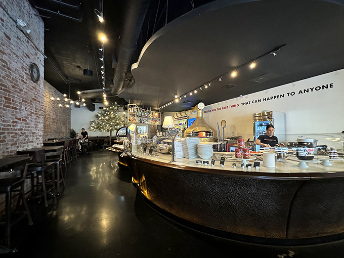 Where pizza dreams come true! The curved counter and exposed brick create that perfect balance of rustic charm and modern elegance.