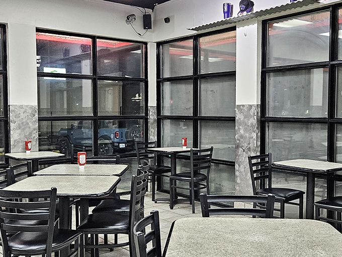 Simple tables and chairs say, "We're not here for the fancy stuff." This no-frills dining room lets the food do all the talking.