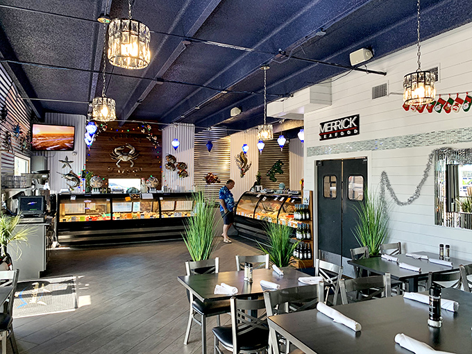 Where seafood market meets restaurant magic &ndash; the interior's nautical blues and wooden accents set the perfect stage for oceanic delights.