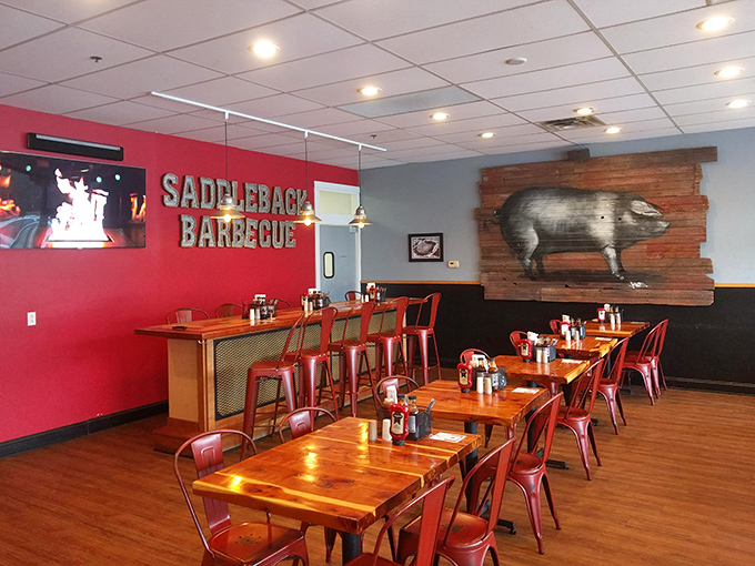 That pig artwork isn't just decoration&mdash;it's a mission statement. Red walls and wooden tables create the perfect backdrop for meat-induced euphoria.
