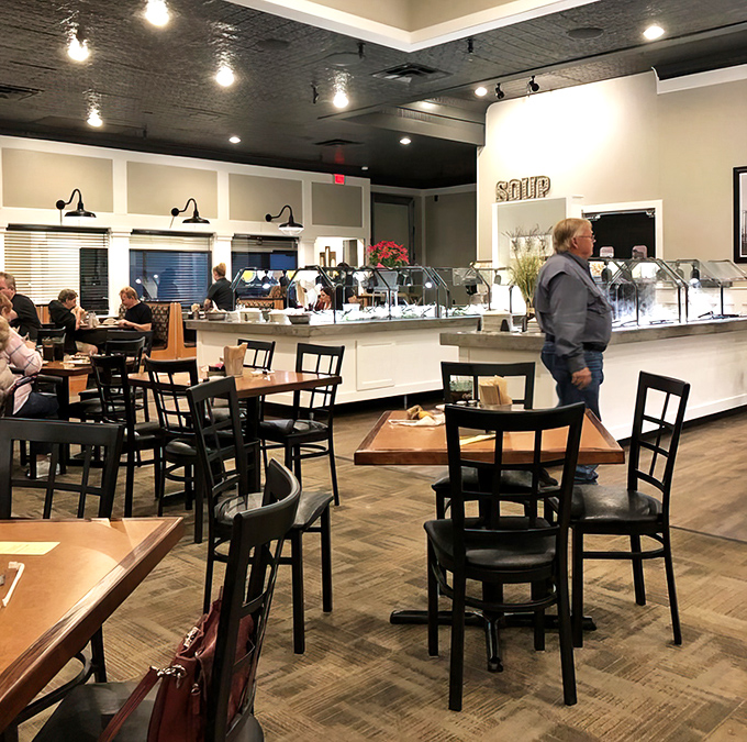 Inside, the buffet's gleaming stations await beneath pressed tin ceilings, promising a culinary journey where the only limitation is your waistband's elasticity.