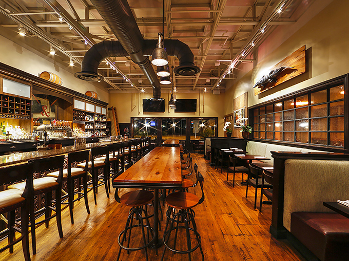 Warm wooden floors, exposed industrial ceiling, and that perfect amber lighting&mdash;this is what happens when comfort and sophistication decide to be roommates.