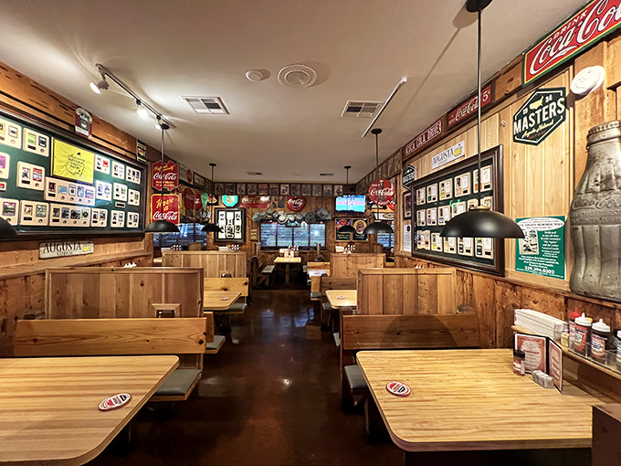 Wood-paneled walls and vintage signs create the perfect backdrop for serious barbecue business &ndash; no pretense, all flavor.