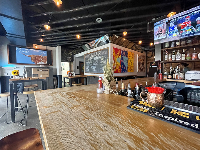 The bar at Walter's isn't trying to impress anyone, which is precisely why it does. Wooden countertops, exposed ceiling, and TVs tuned to whatever's on&mdash;perfect BBQ authenticity.