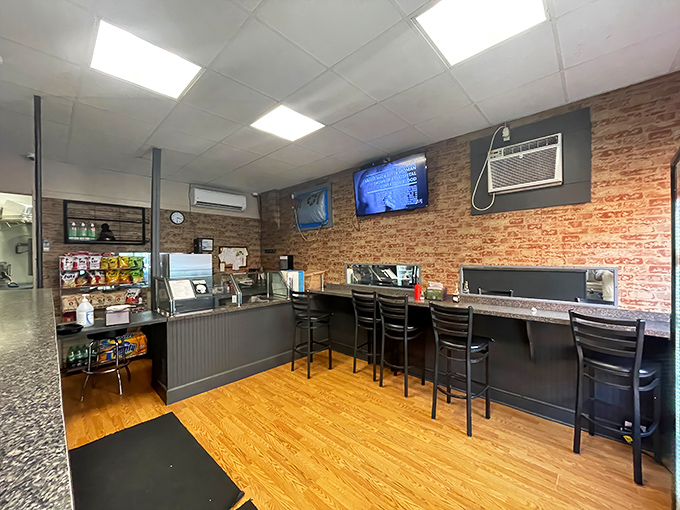 Exposed brick walls and no-nonsense seating tell you everything: this place prioritizes substance over style. Your stomach will thank you.