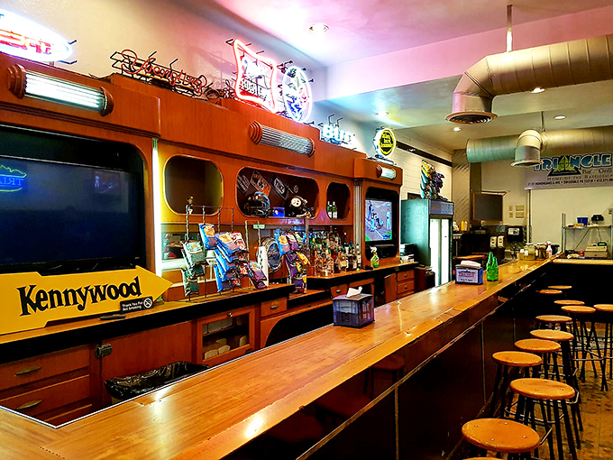 Step inside and you're transported to a classic Pittsburgh bar where the polished wood counter has witnessed decades of sandwich appreciation and Steelers celebrations.