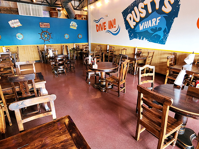 Step into this nautical-themed dining room where comfort meets coastal charm in perfect harmony.