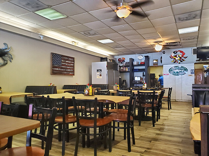 Simple tables, American flag pride, and crab decorations tell you everything you need to know&mdash;you're here for serious eating, not interior design awards.