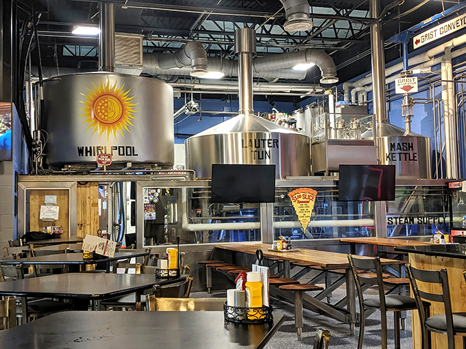 Where beer meets food in perfect harmony. The brewing tanks aren't relegated to some back room—they're the stars of the show, visible throughout the dining area.