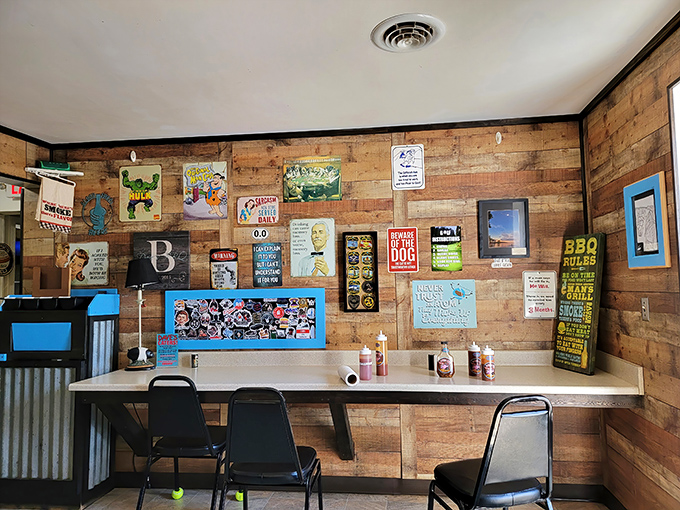 Rustic wooden walls adorned with BBQ wisdom create the perfect backdrop for meat meditation. No fancy frills, just the promise of flavor.