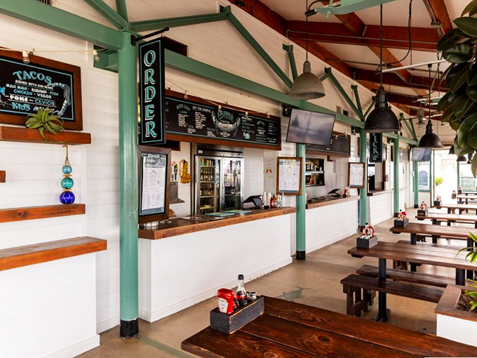 Rustic wooden beams and no-nonsense seating tell you everything: this place prioritizes what's on your plate, not under it.