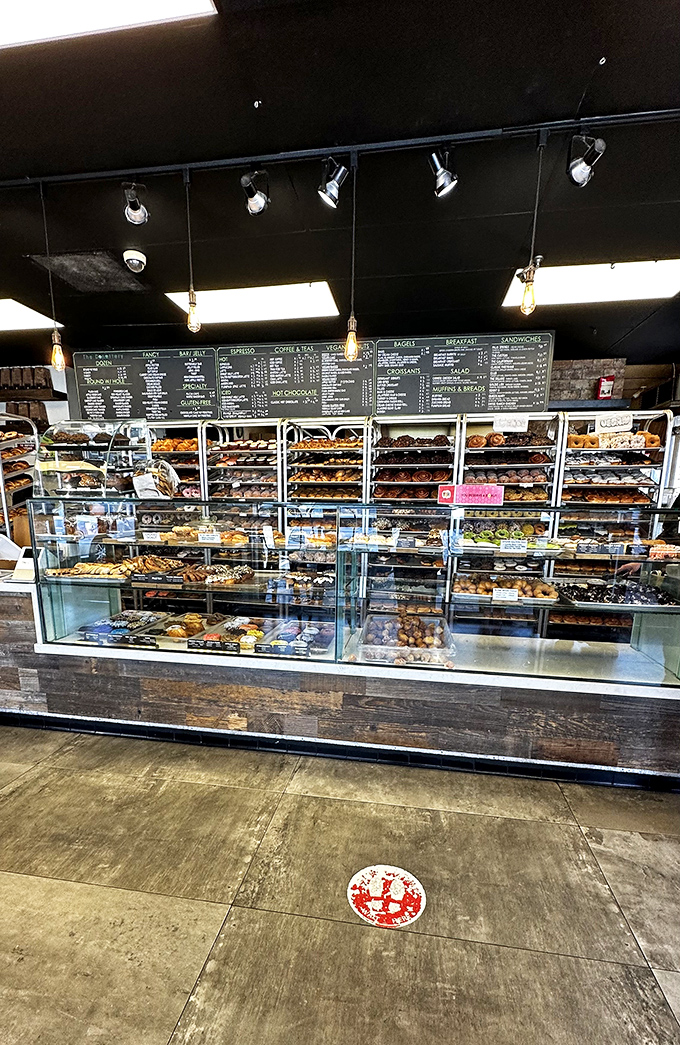 Donut nirvana awaits behind this glass case, where pastry dreams come true and diets go to die.