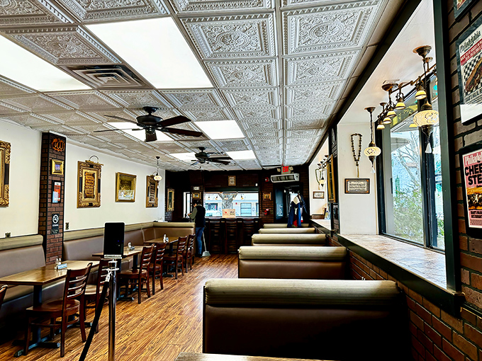 Those ornate tin ceiling tiles aren't just decoration&mdash;they're witnessing decades of delicious conversations happening beneath them.