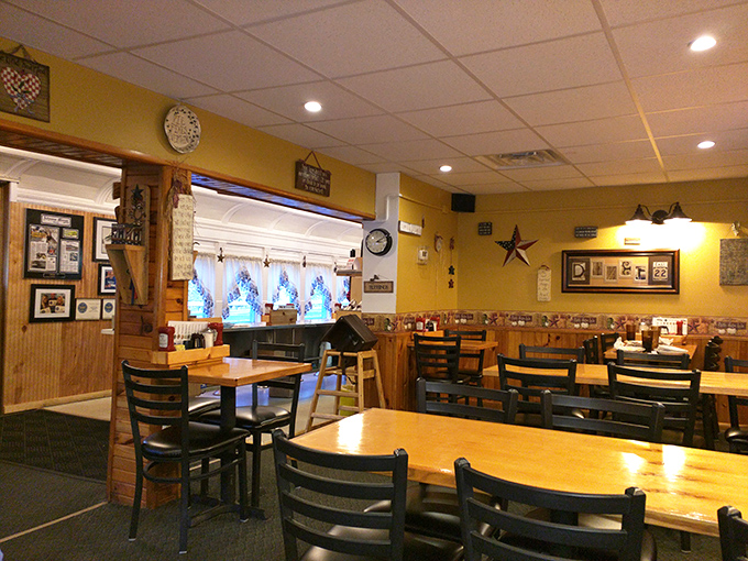 Warm yellow walls and wooden accents create that "grandma's kitchen" feeling, where calories don't count and coffee refills are practically mandatory.