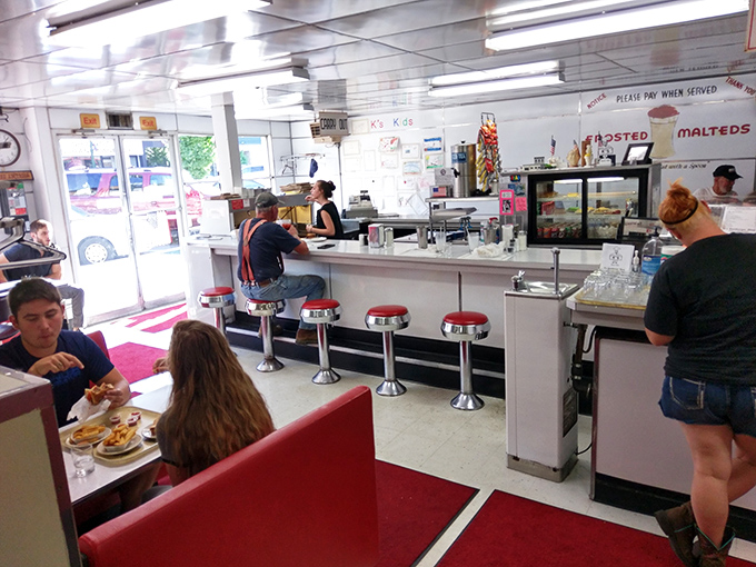 Inside K's, the gleaming counter, chrome stools, and red vinyl booths aren't retro by design—they're authentic relics from a time when diners were America's living rooms.
