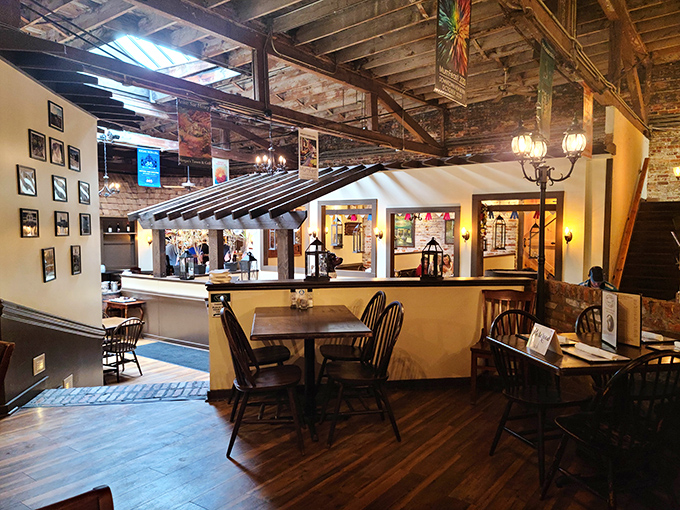 Step inside to discover a masterclass in historic renovation – exposed brick walls and wooden beams create a space that's both rustic and refined.