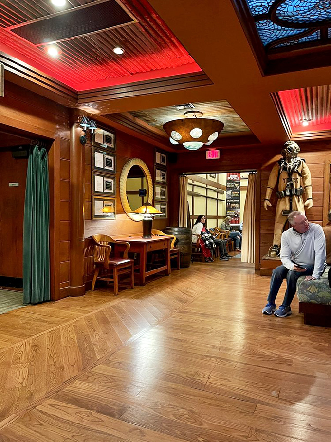 Step inside and you're transported to a maritime wonderland where vintage diving gear and warm wood paneling create the perfect backdrop for seafood adventures.